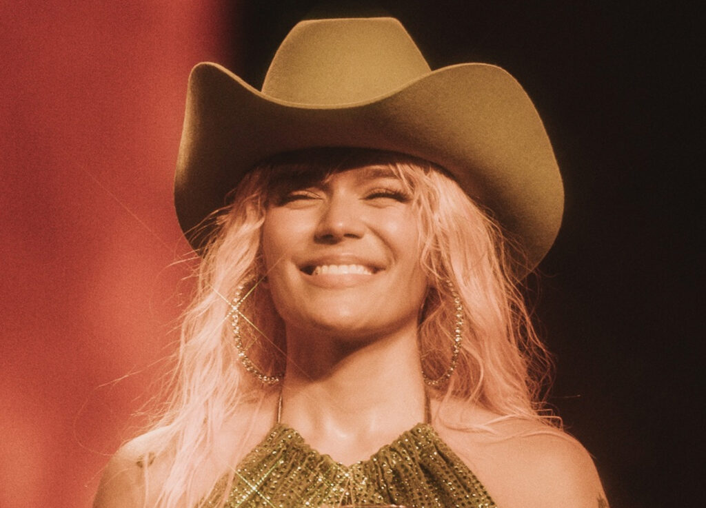 WATCH: Karol G Rings In the Summer With the Merengue ‘Si Antes Te ...